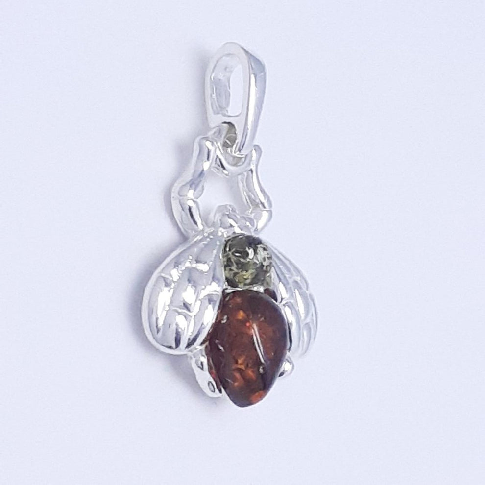 DIJE CARDI – Excelencia en Ámbar